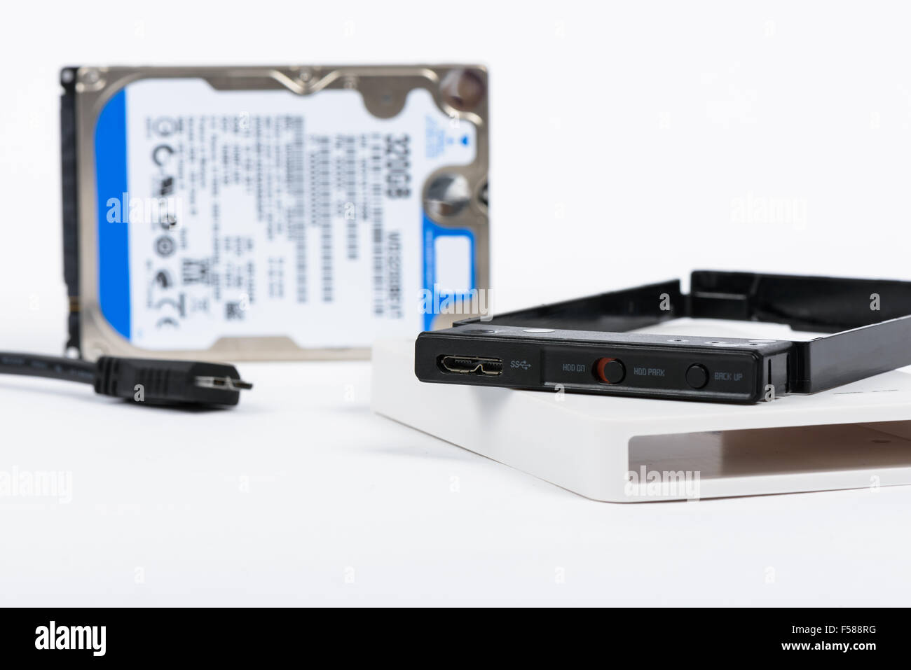 components of External Enclosure case and 2.5 inch Hard Disk Drive on a ...