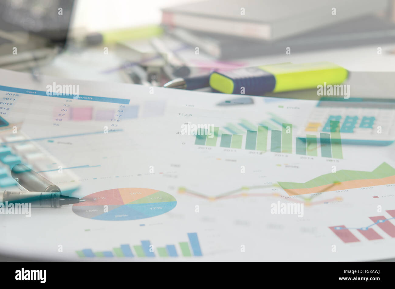 Graphs and charts, business table. The workplace of business people ...