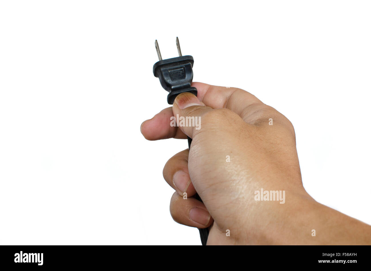 Power plug in a hand on a white background Stock Photo - Alamy