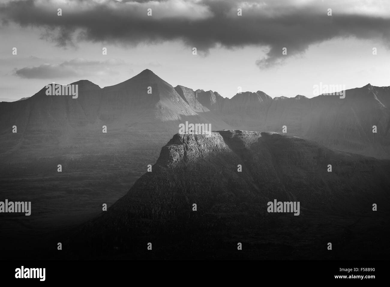 Spidean a' Choire Leith (Liathach) behind Carn na Feola sidelit by soft ...
