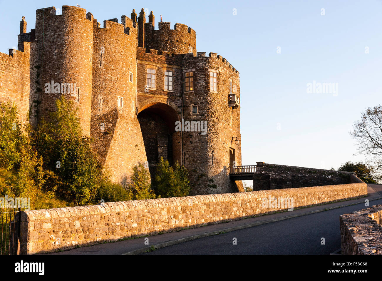 England, Dover castle. The imposing Constables Gate, side view with sunset light on the walls ...