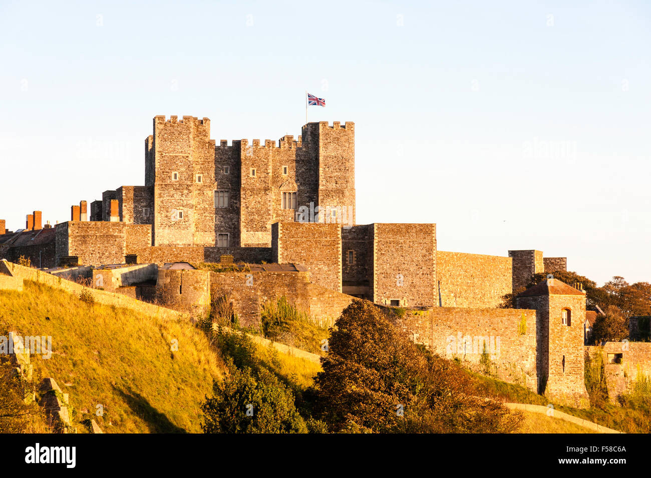 England, Dover castle. Castle on horizon showing walls and keep lit up ...