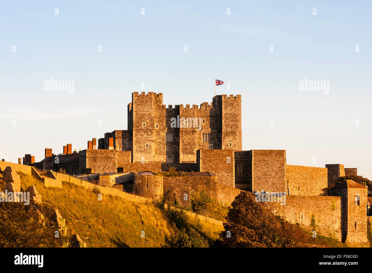 England, Dover castle. Castle on horizon showing walls and keep lit up ...