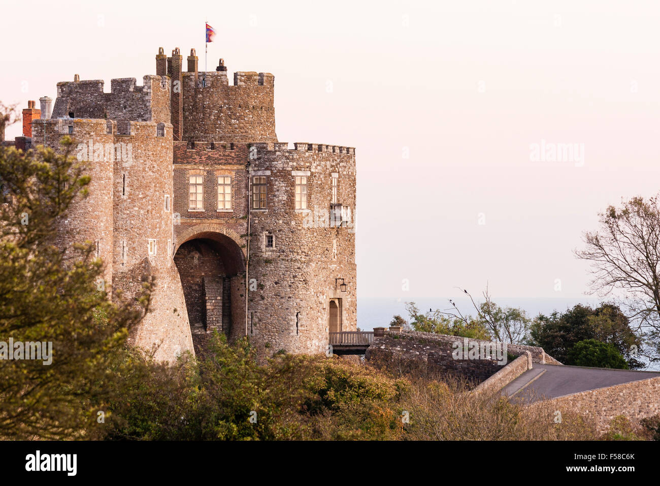 England, Dover castle. The imposing Constables Gate, side view with sunset light on the walls ...