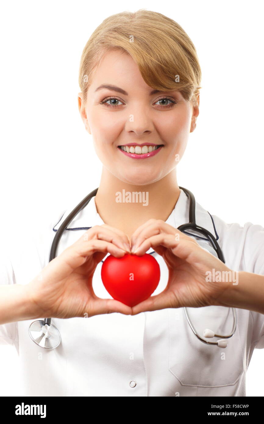 Smiling woman doctor cardiologist in white apron with stethoscope ...