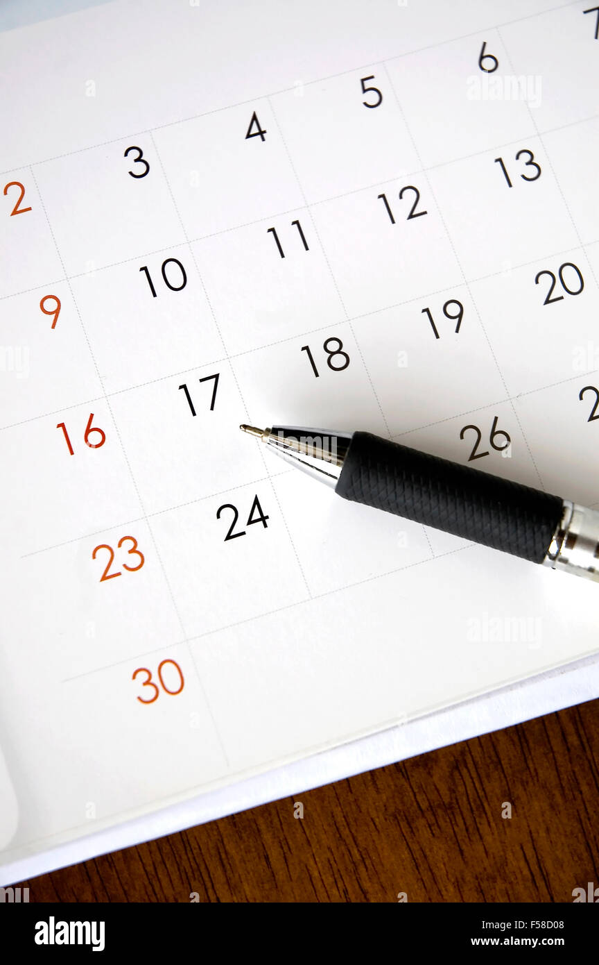 pen point to date on calendar Stock Photo - Alamy
