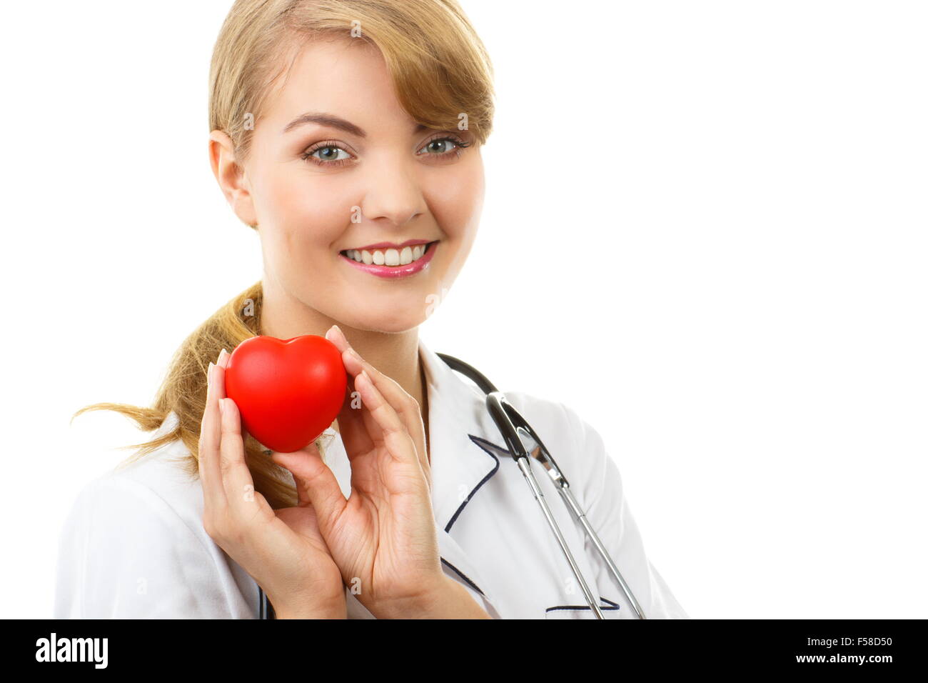 Smiling woman doctor cardiologist in white apron with stethoscope ...
