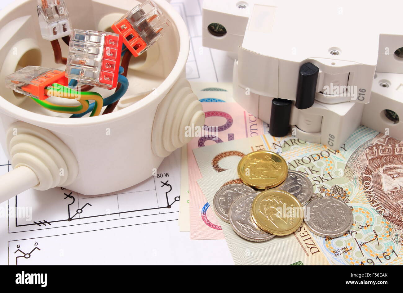 Copper wire connections in electrical box, electric fuse and money on ...