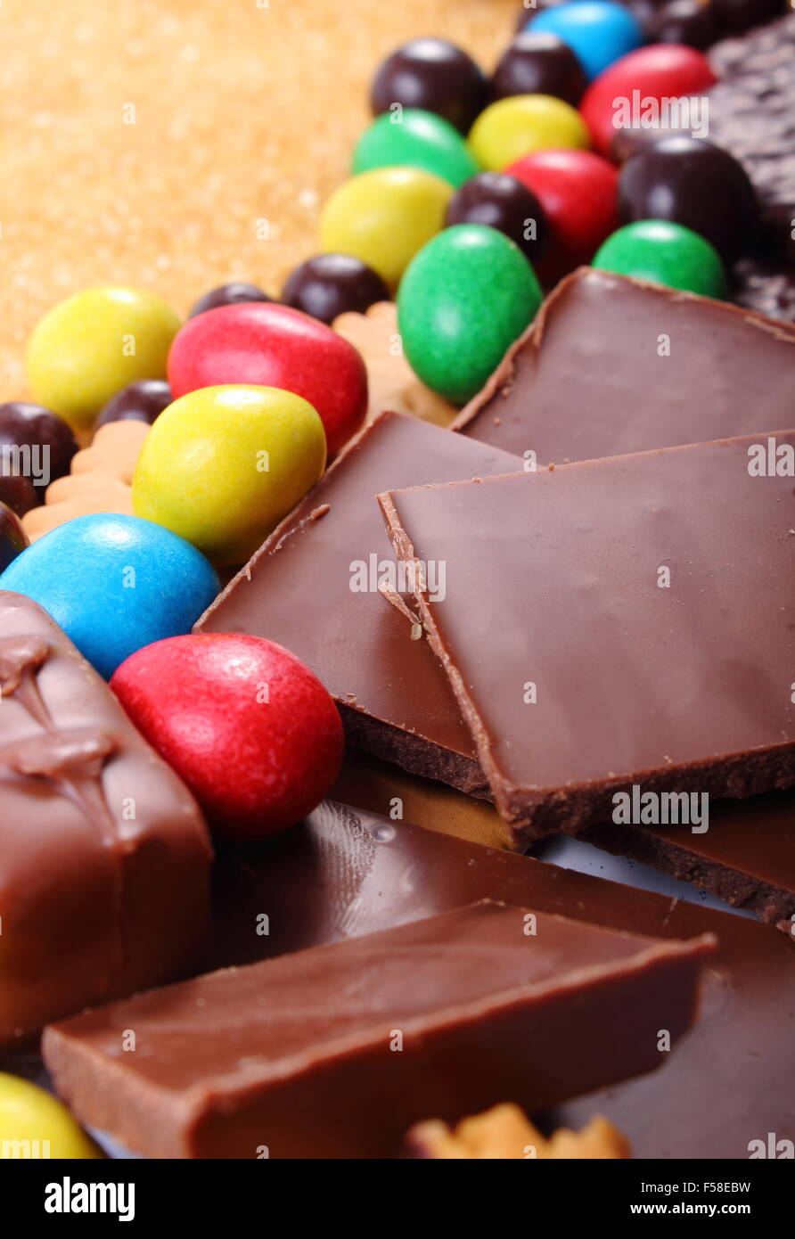 A lot of candies and cookies with brown cane sugar, too many sweets ...