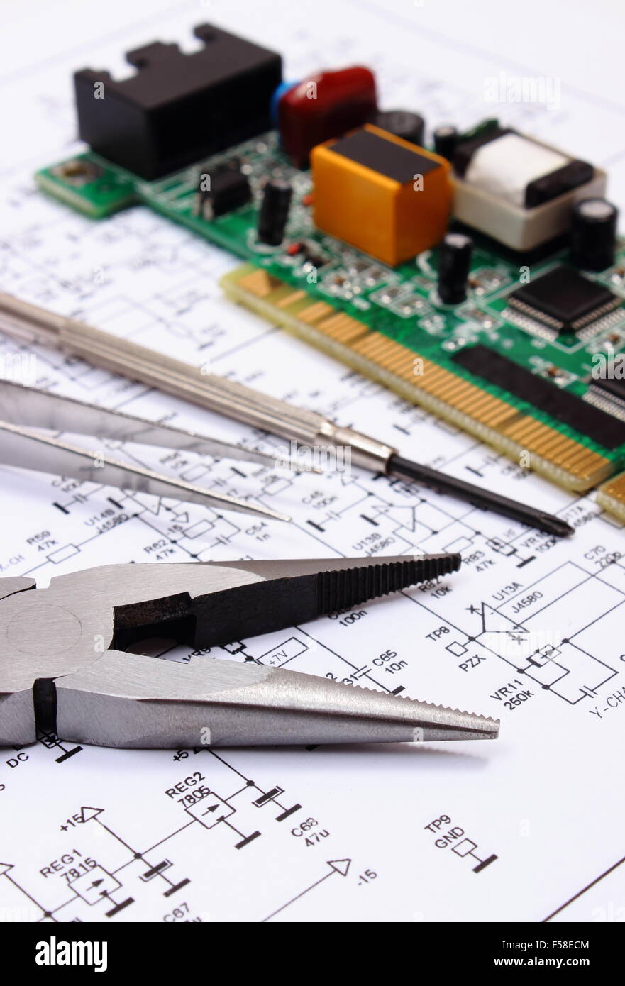 Printed circuit board with electrical components and precision tools ...