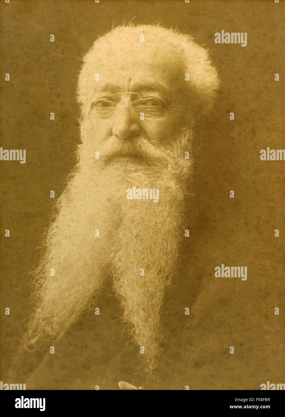 Portrait of an old man with a very long beard, Italy Stock Photo - Alamy