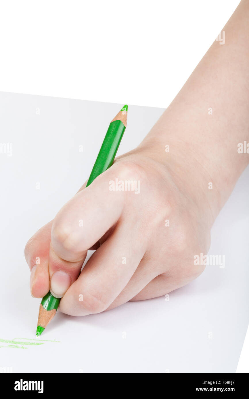 hand drafts by green pencil on sheet of paper isolated on white ...