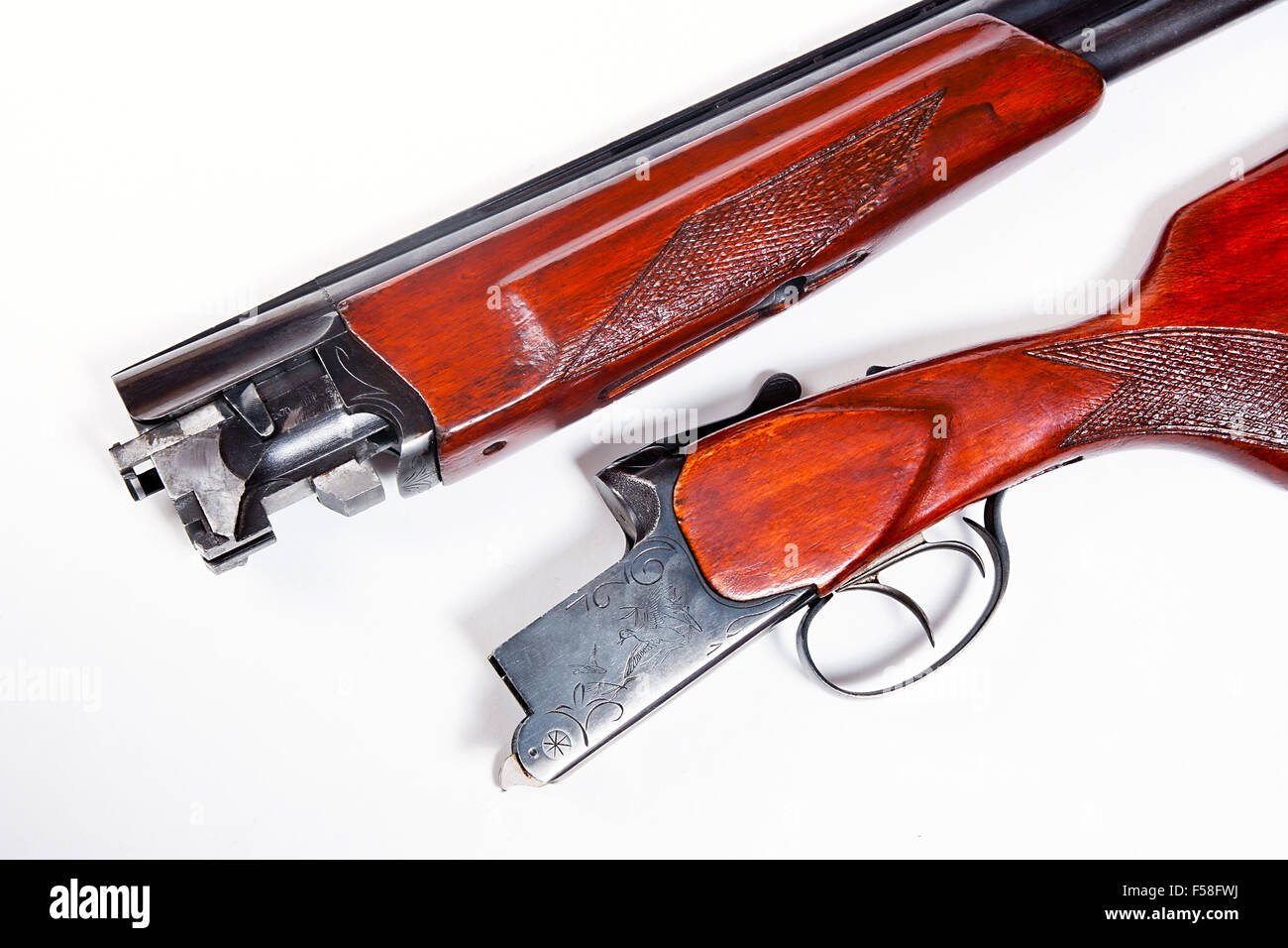 Hunting shotgun on white background. Close up view showing mechanism of ...