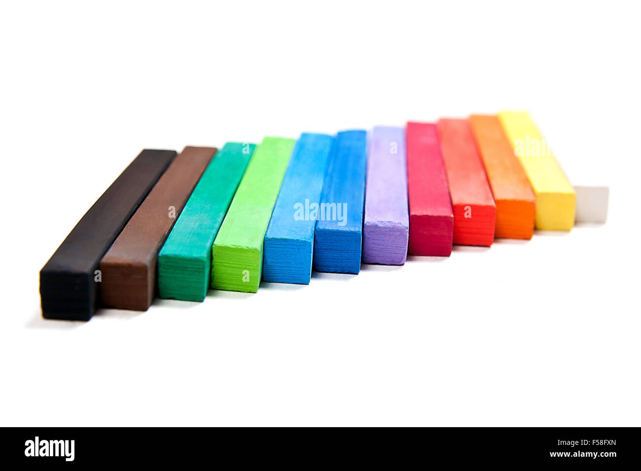 View of different color chalks pastel isolated on the white background ...