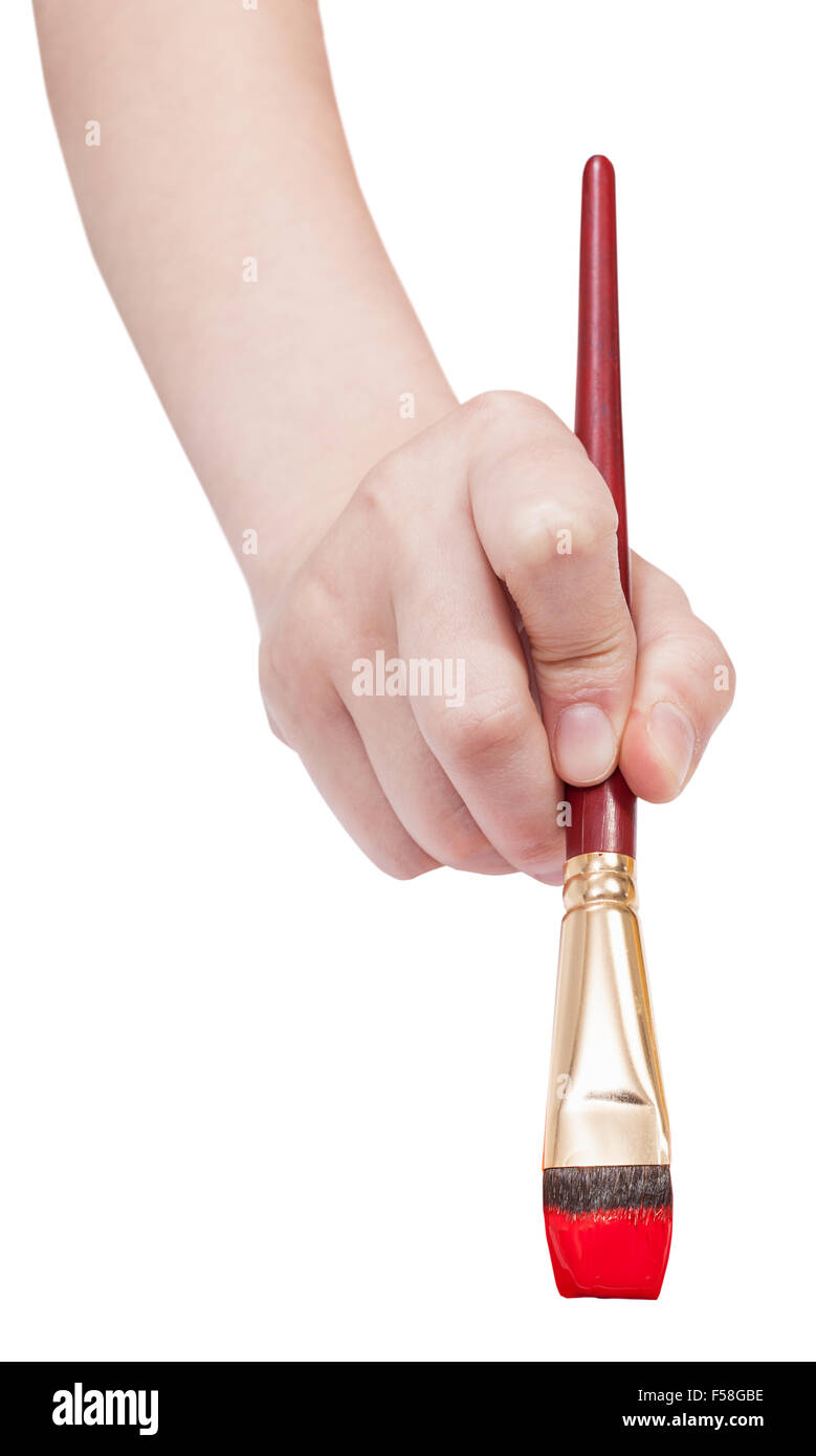 direct view of hand with red artistic flat paintbrush isolated on white ...