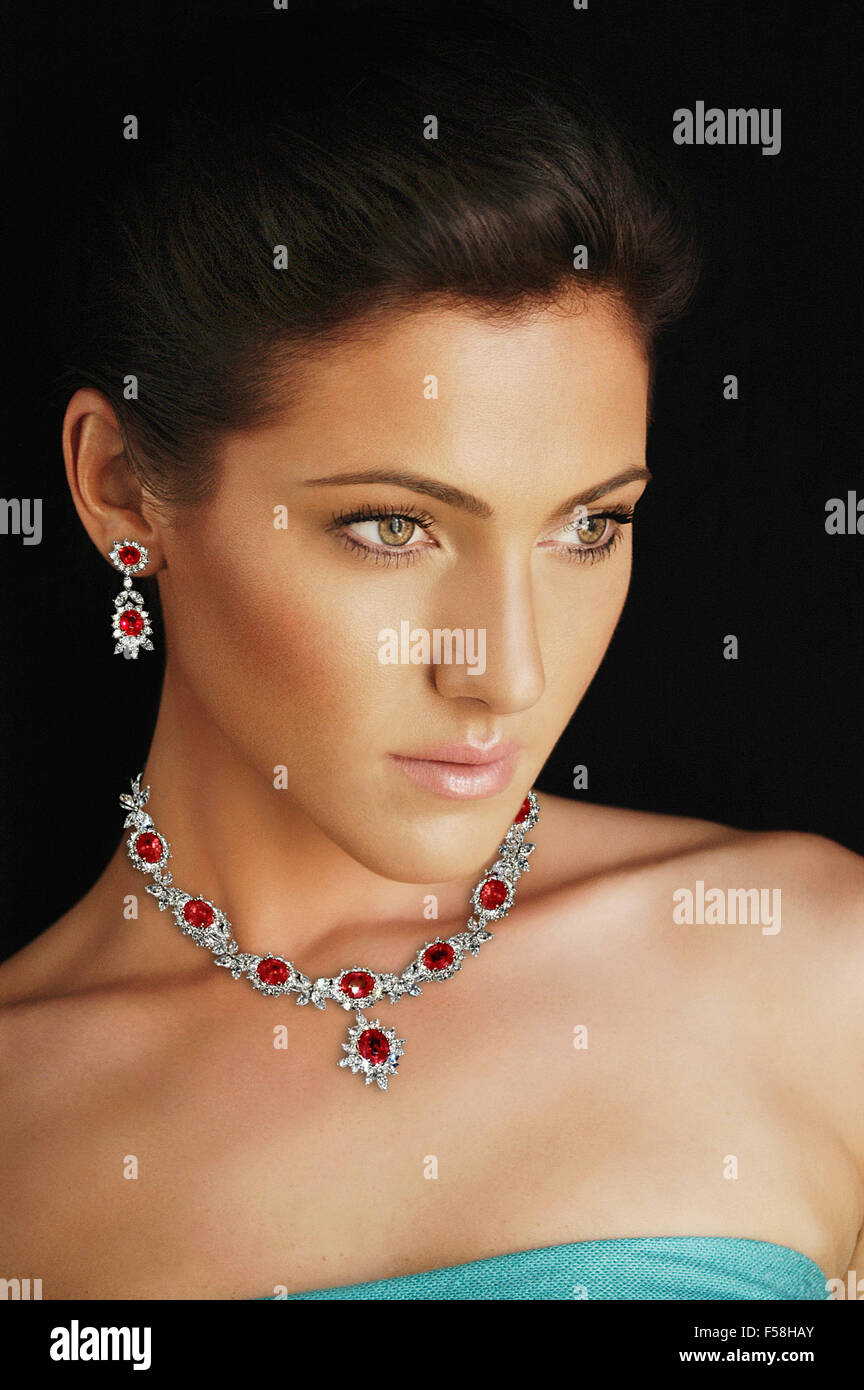 Beautiful model wearing exclusive jewelry Stock Photo - Alamy
