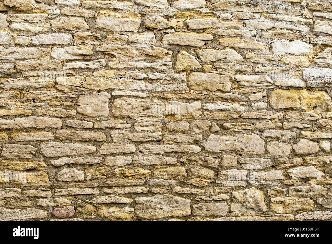 Stone wall background Stock Photo - Alamy