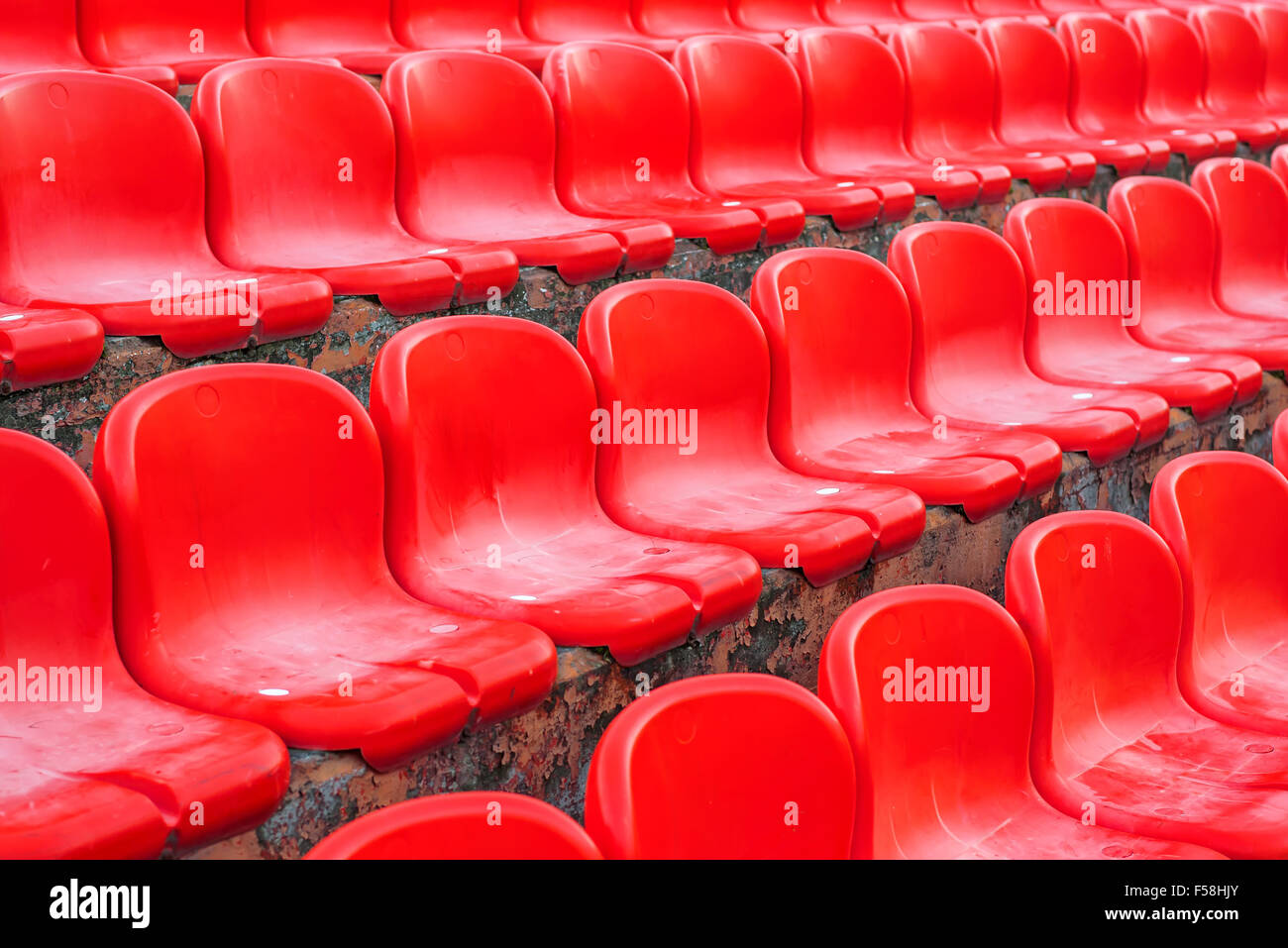 Red seating pattern football stadium hi-res stock photography and ...