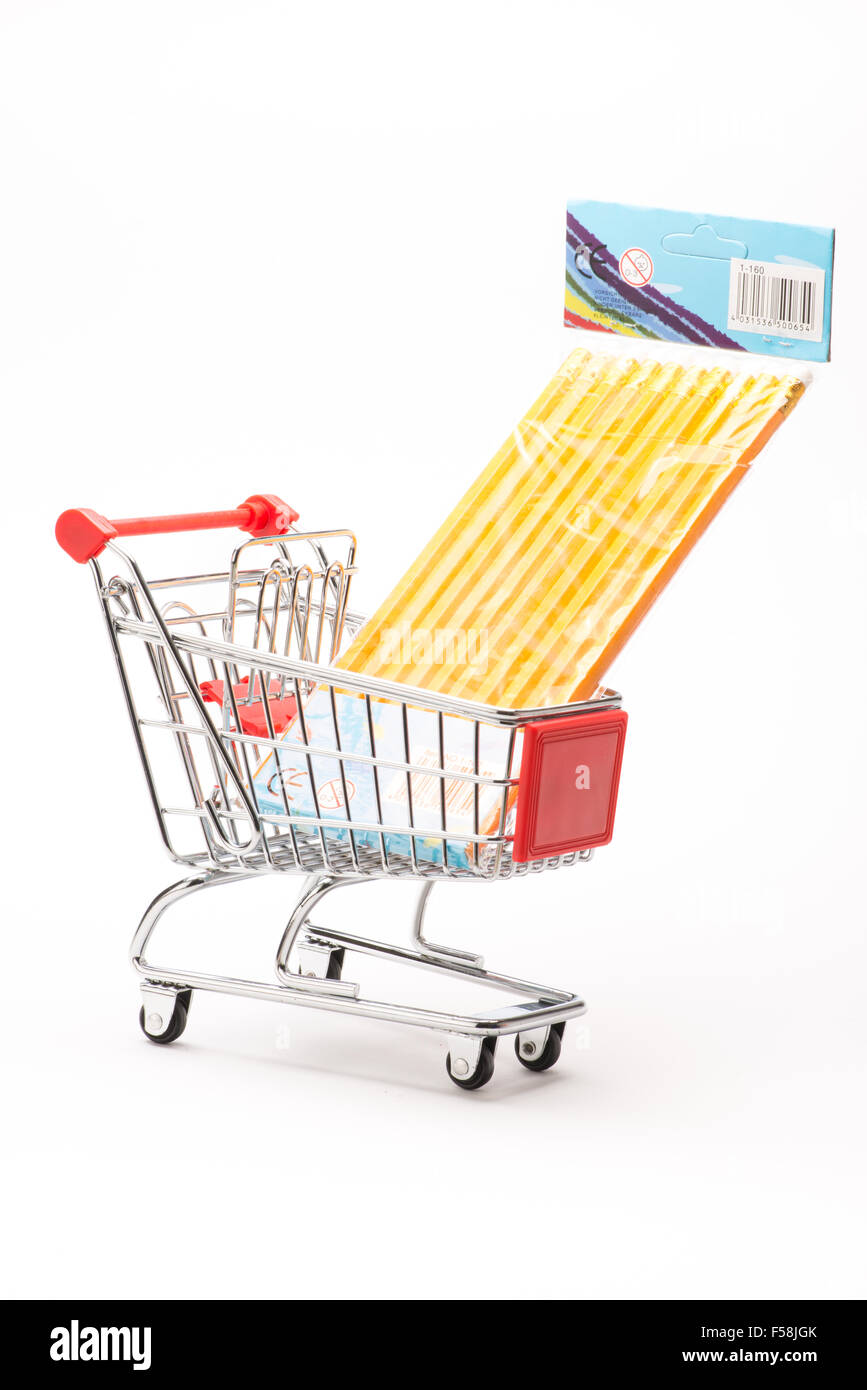 Caddy with school equipment on white background Stock Photo - Alamy