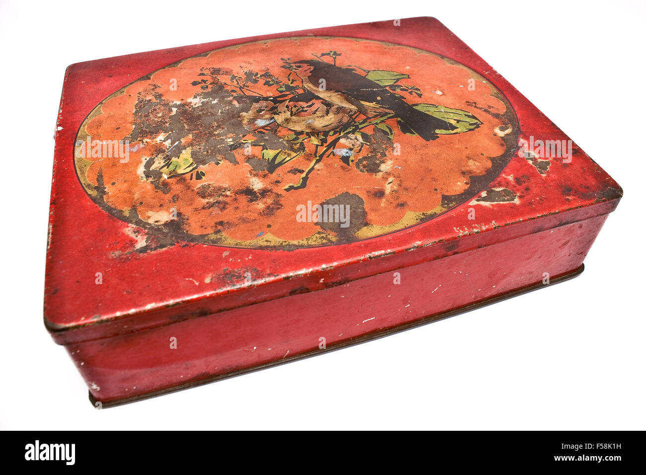 Rusty red tin box isolated on white Stock Photo - Alamy