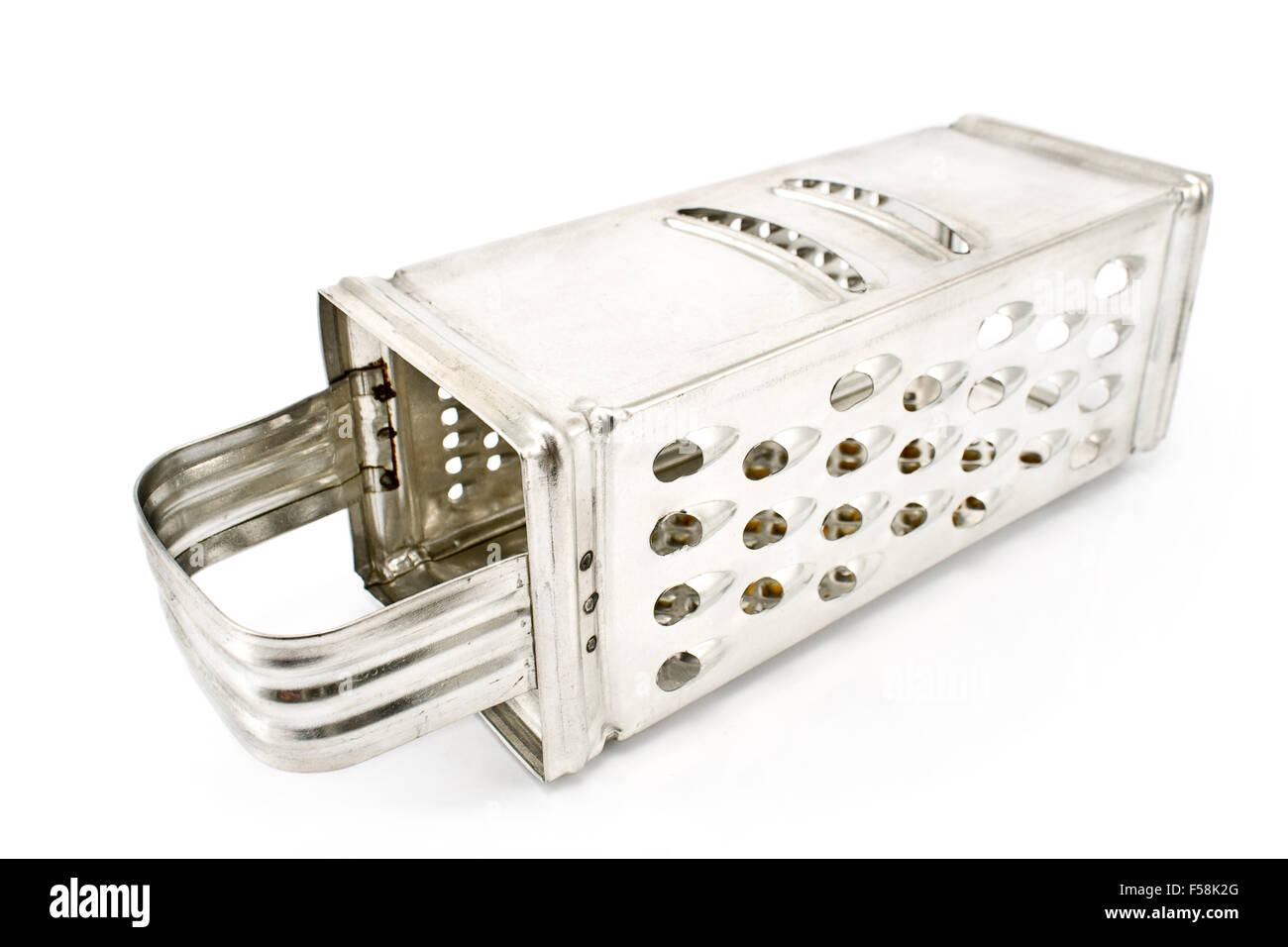 Metal grater isolated on white Stock Photo - Alamy
