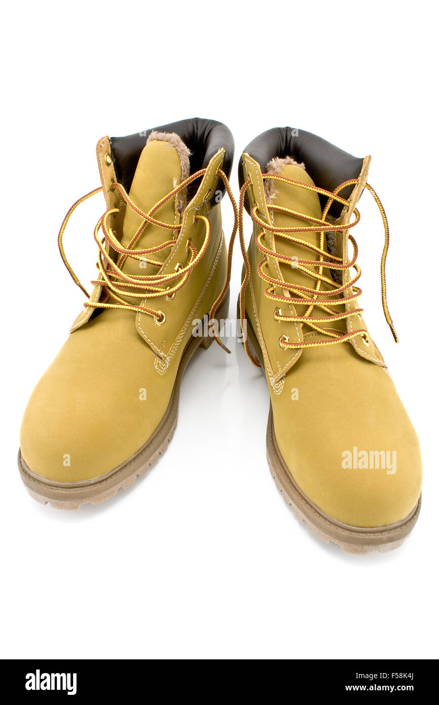 New yellow boots isolated on white Stock Photo - Alamy