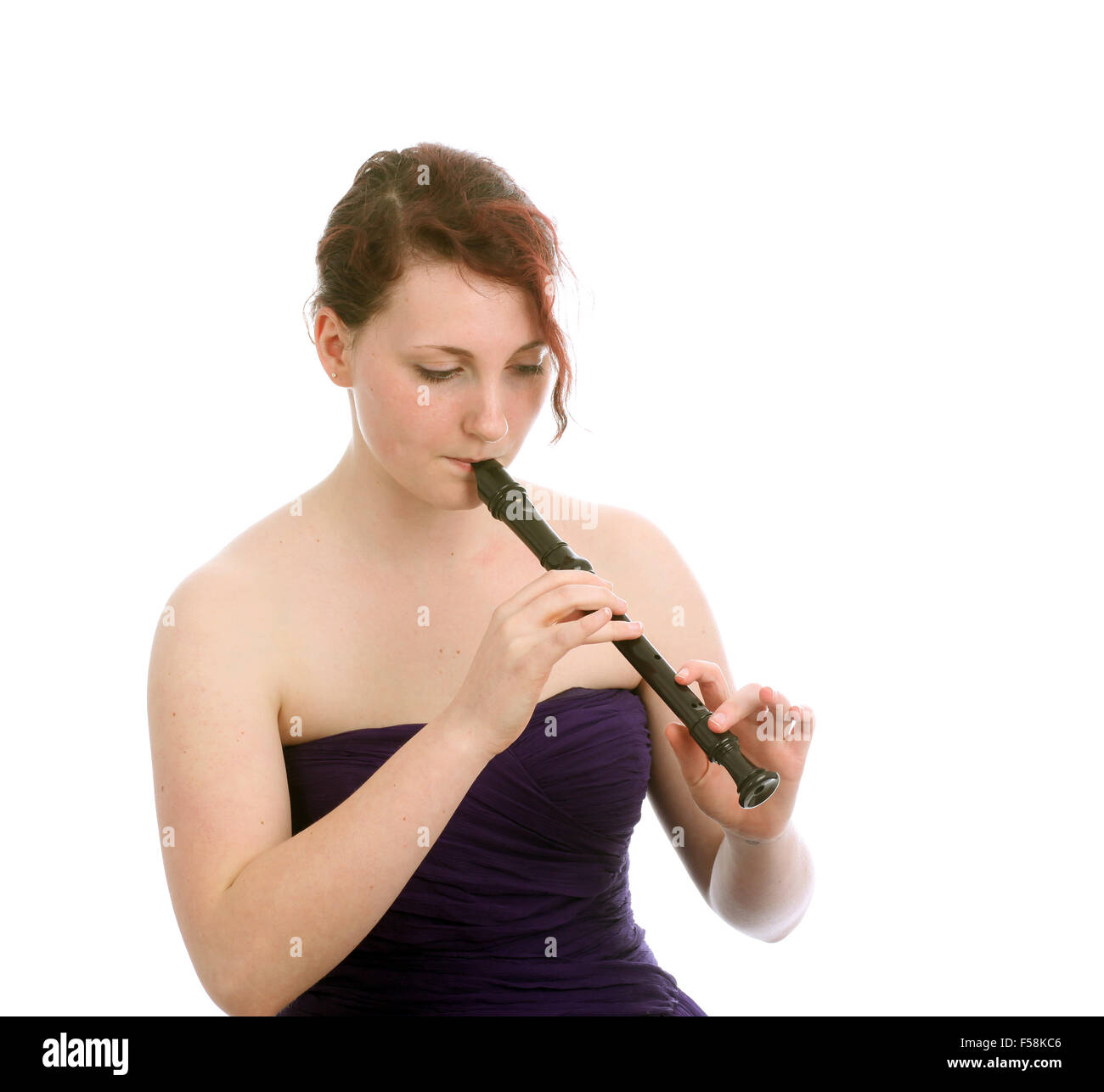 Young woman playing recorder hi-res stock photography and images - Alamy