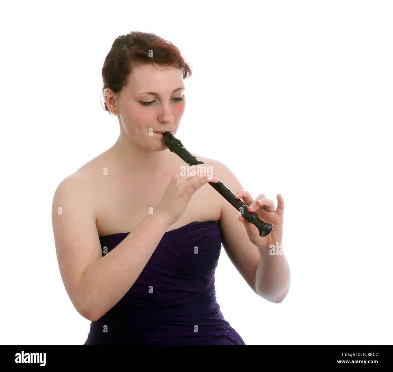 Young Woman Playing Recorder Stock Photos & Young Woman Playing ...
