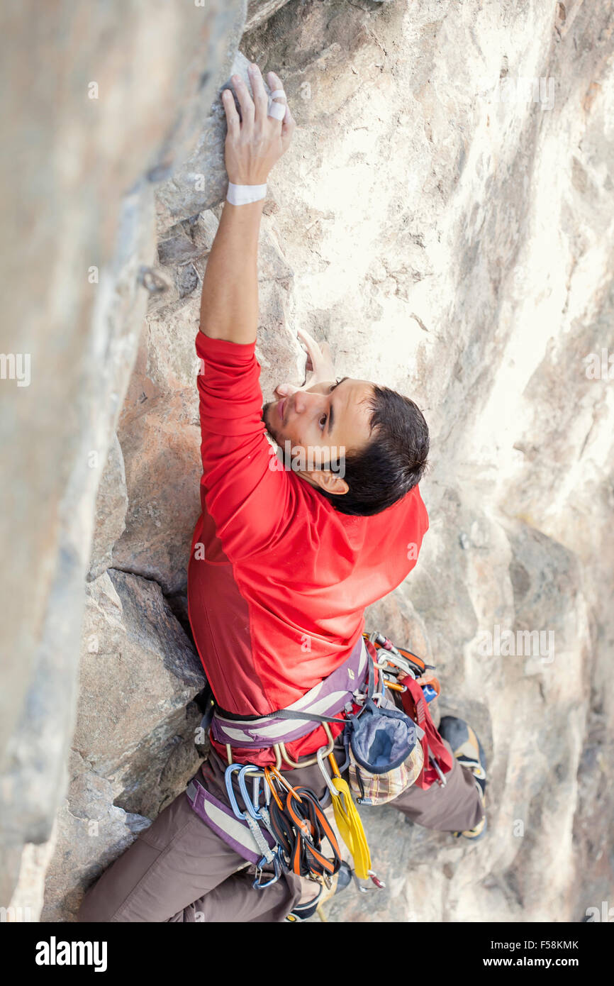 Young climber on the rock wall Stock Photo - Alamy