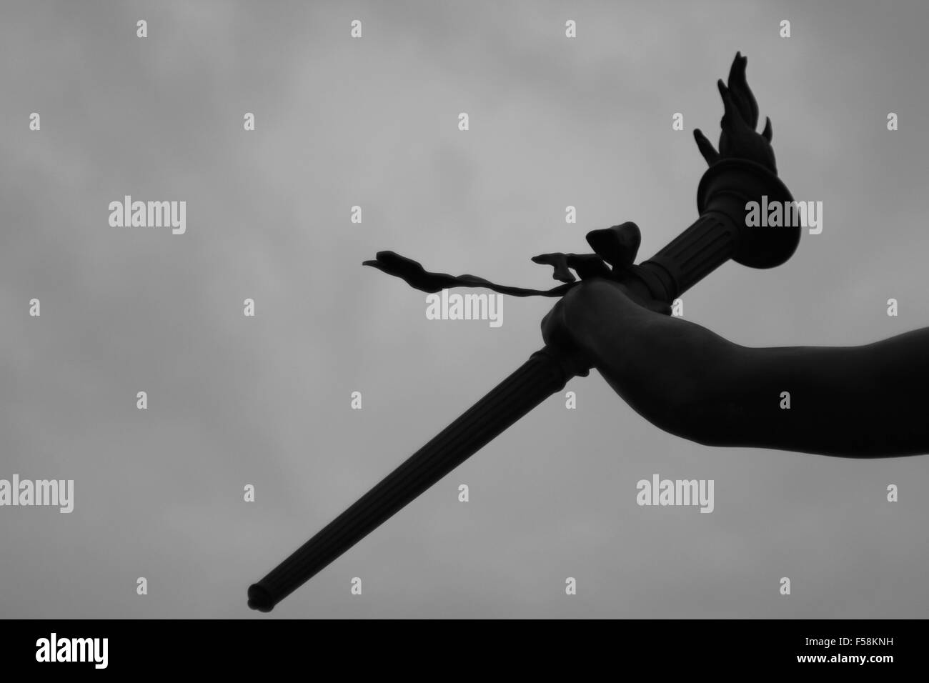 Arm holding torch Black and White Stock Photos & Images - Alamy