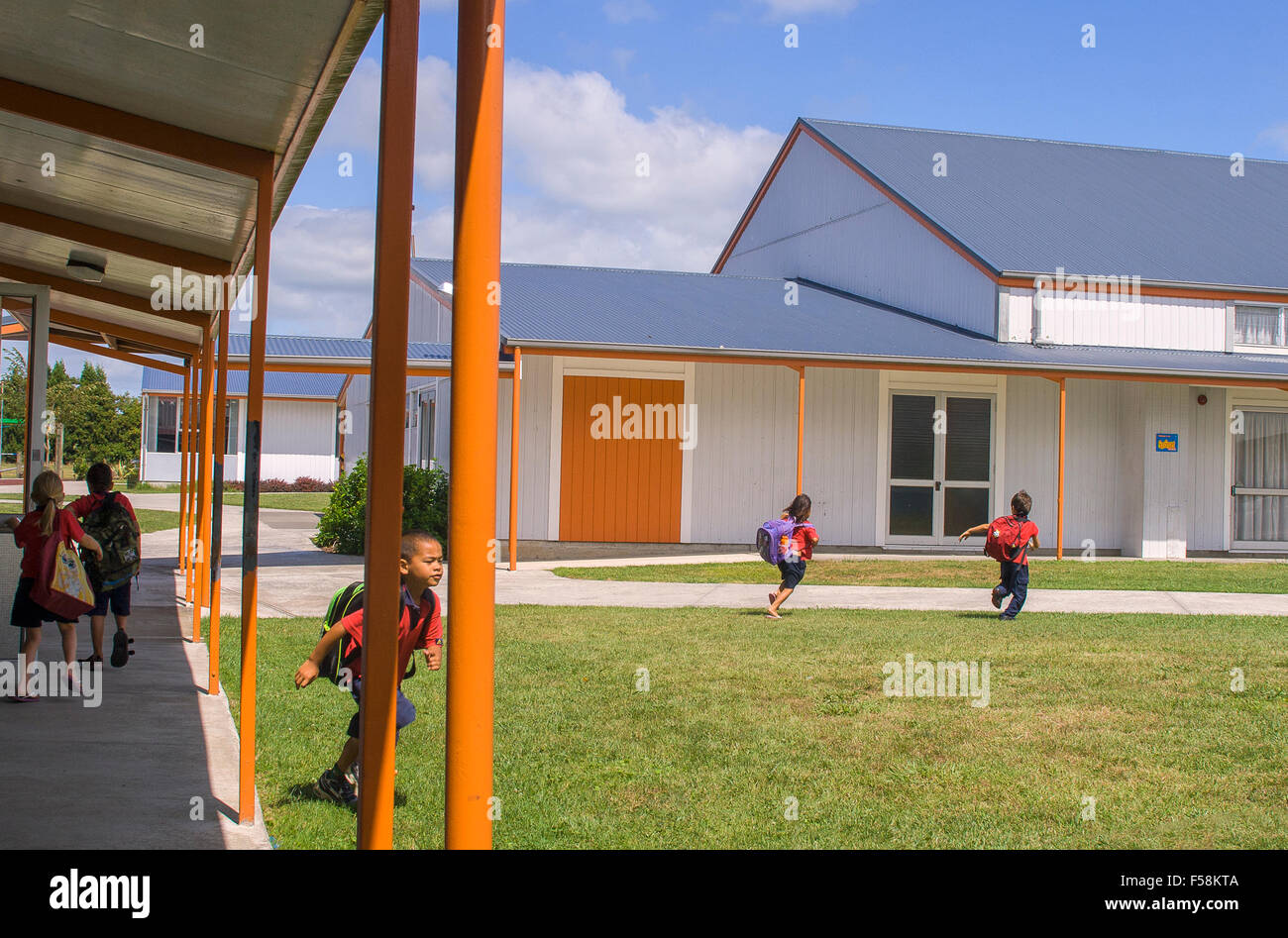 Kids running out of school hi-res stock photography and images - Alamy