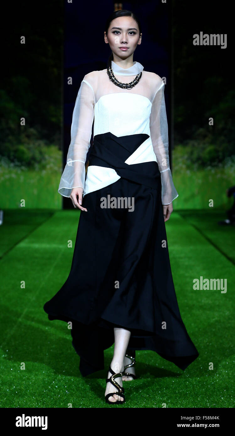 Beijing, China. 30th Oct, 2015. A model shows a creation of PLD Fu Suqin Collection by designing ...