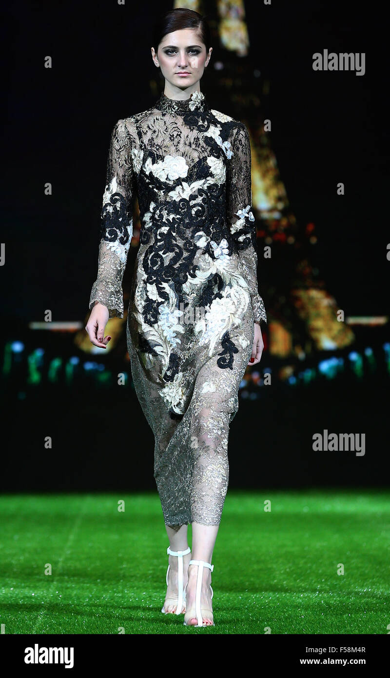 Beijing, China. 30th Oct, 2015. A model shows a creation of PLD Fu Suqin Collection by designing ...