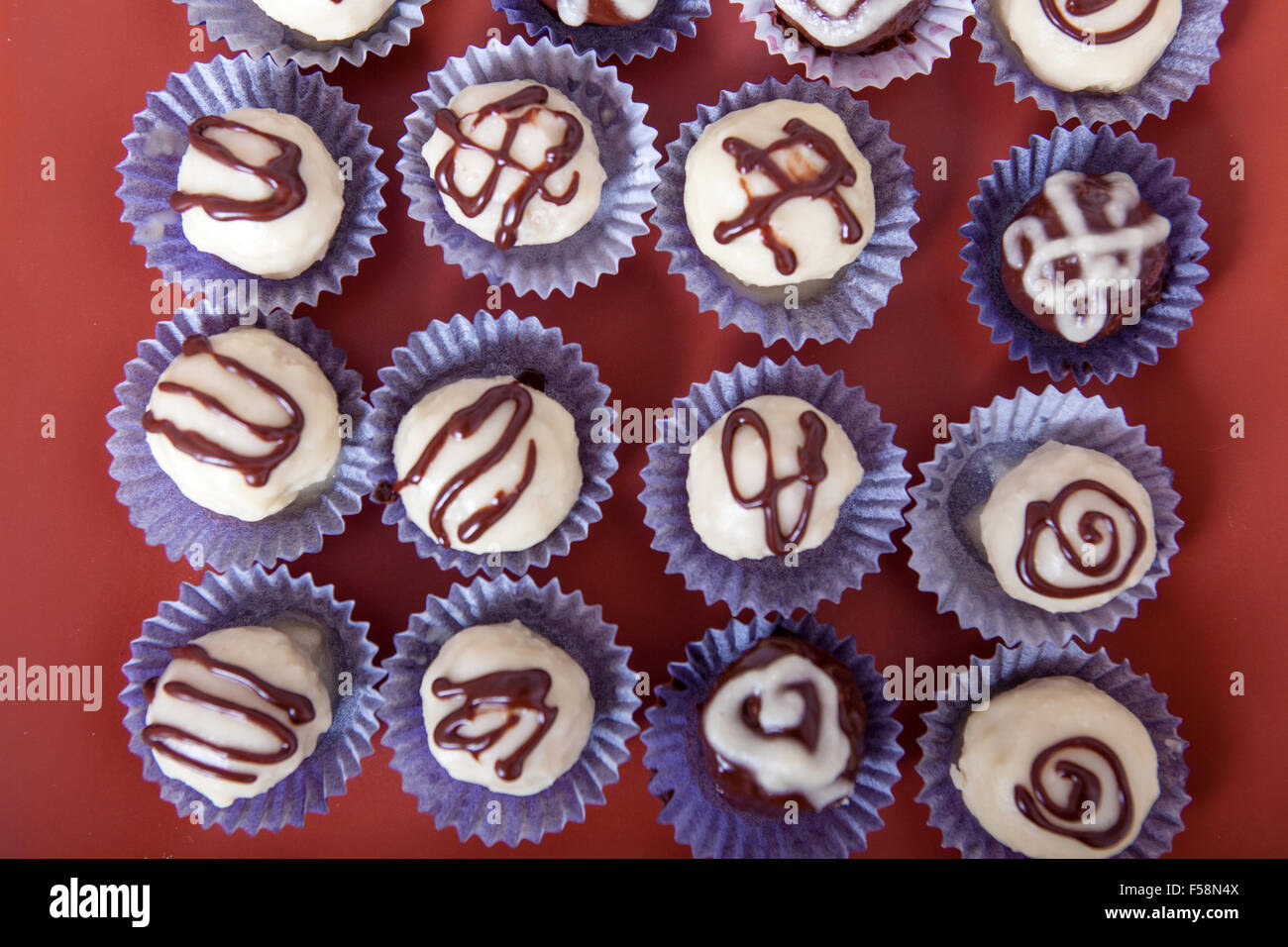 White Chocolate Candy Rolls Stock Photo - Alamy