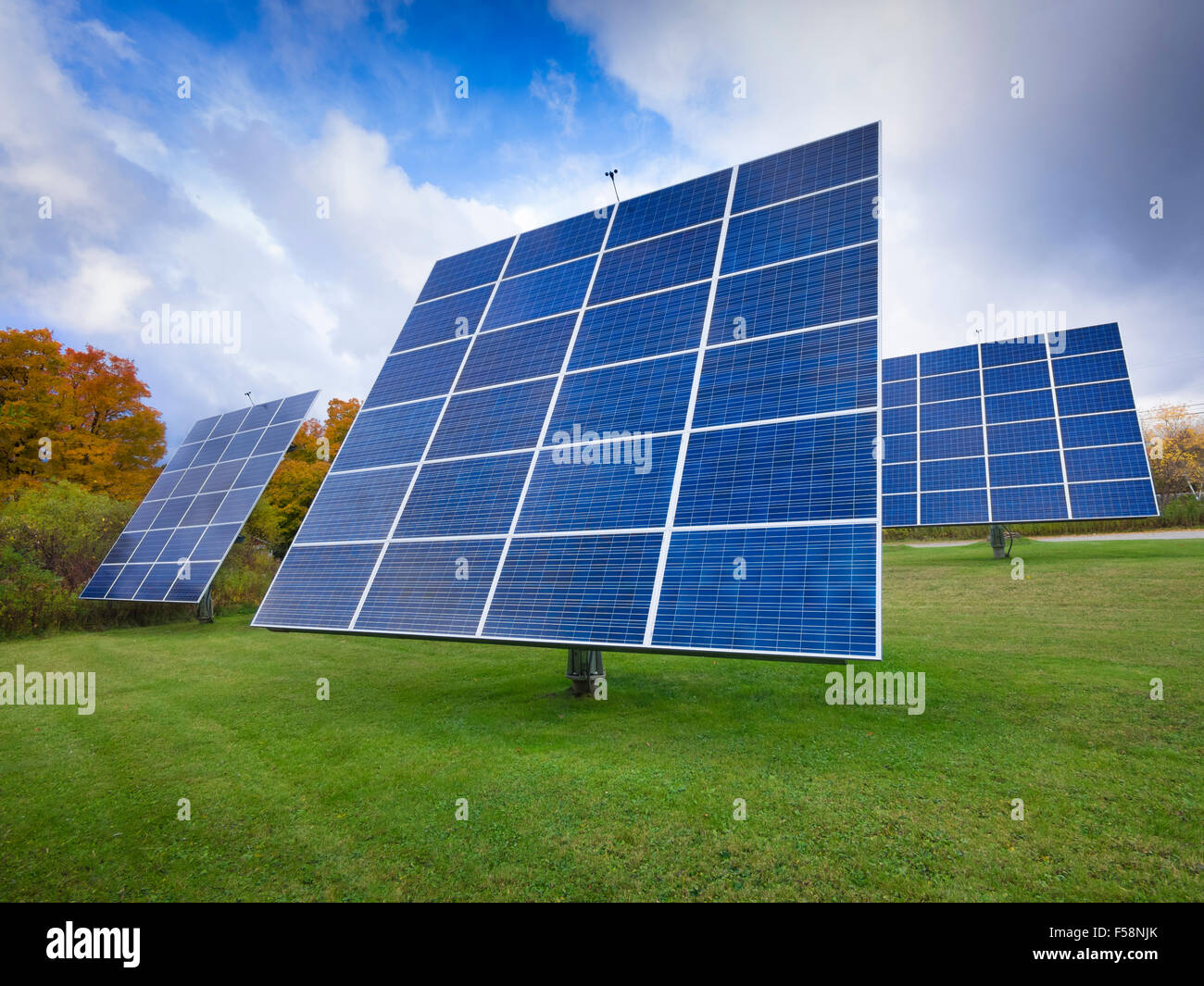 Solar panels in nature surrounded by fall foliage Stock Photo - Alamy