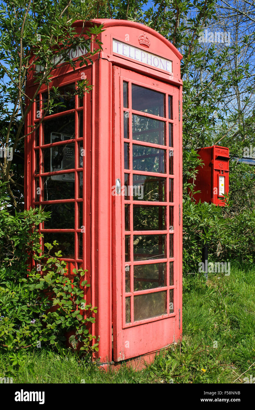 The Age of Communication - an old fashioned telephone box and a post ...