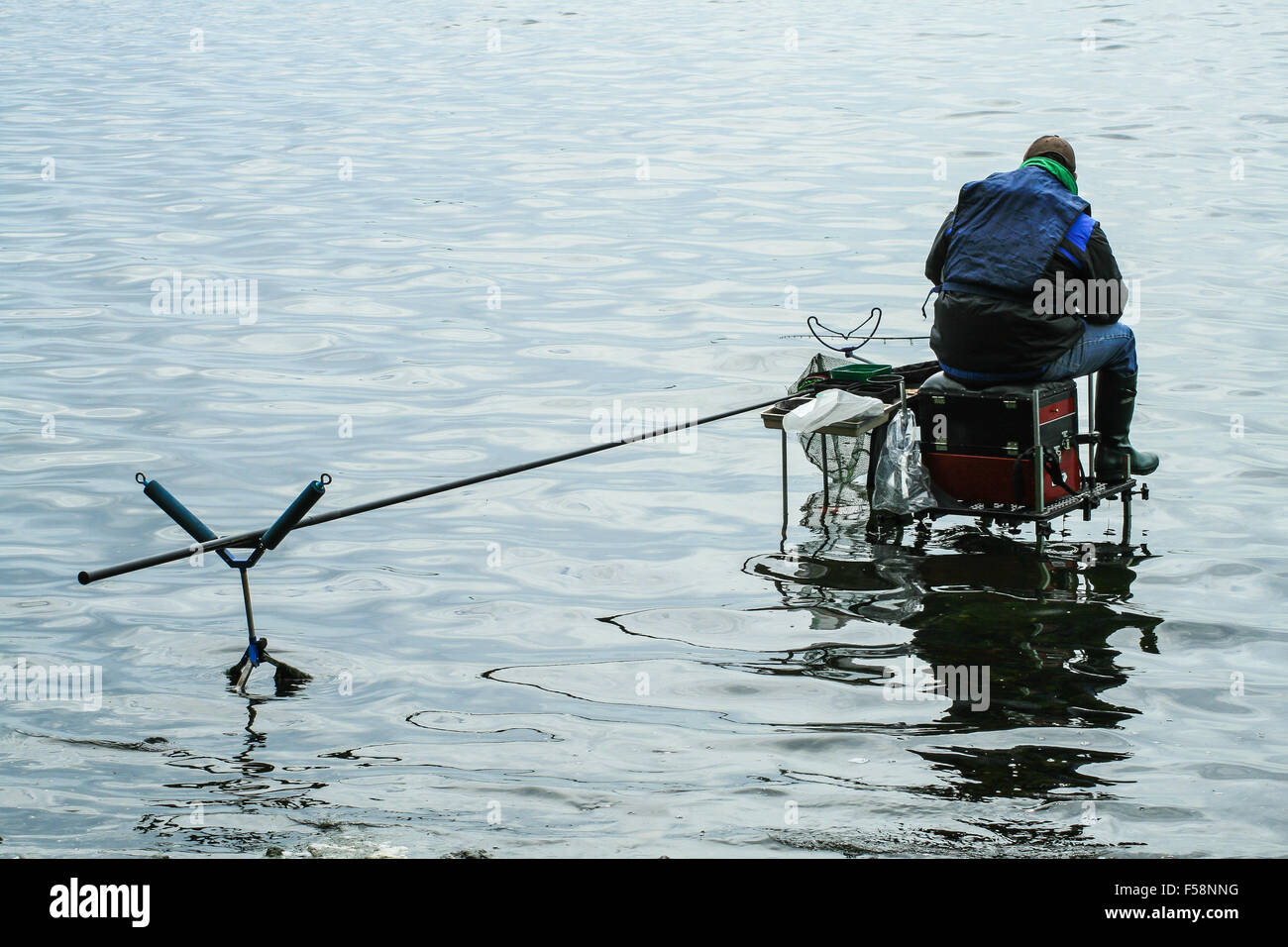 Fisherman sits fishing tackle hi-res stock photography and images - Alamy