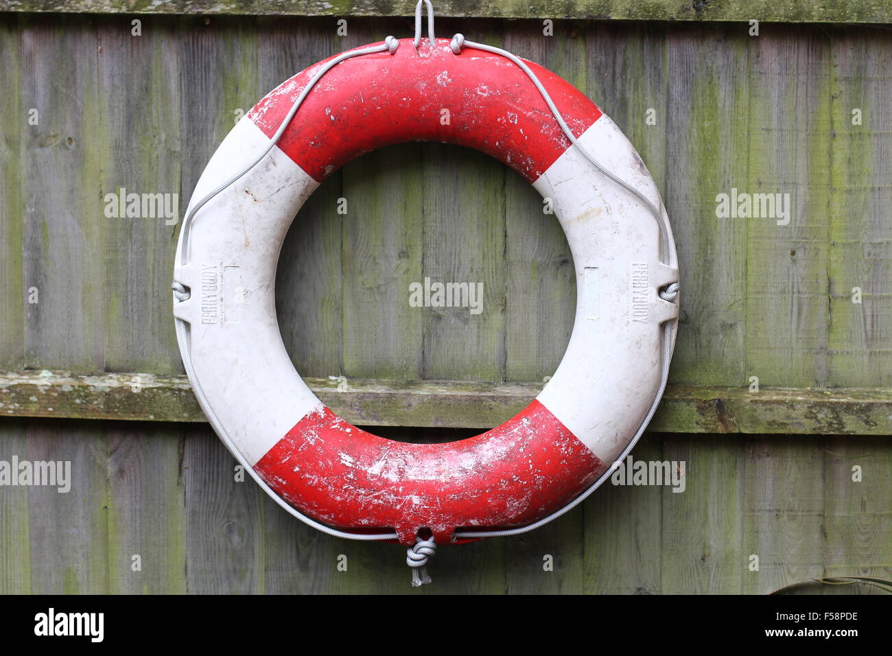 Red and white lifebuoy Stock Photo - Alamy