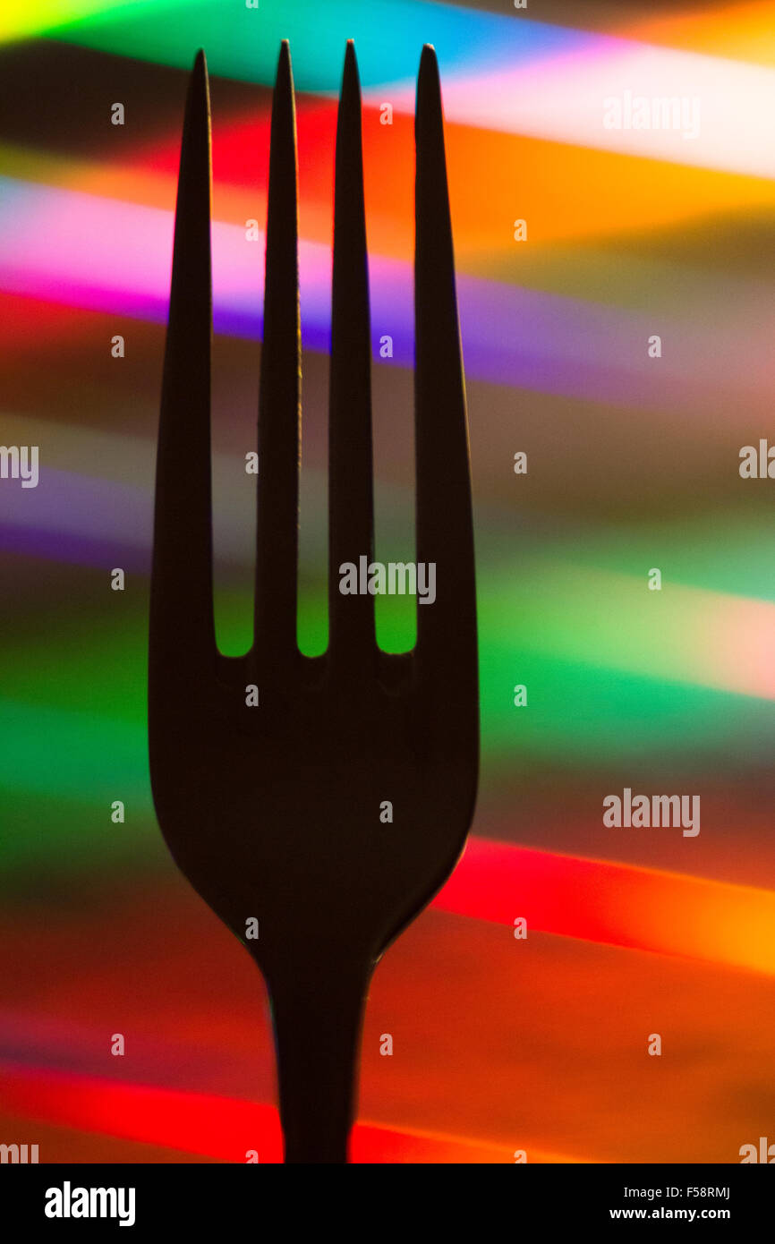 Fork dining symbol silhouette on colorful background photo Stock Photo ...
