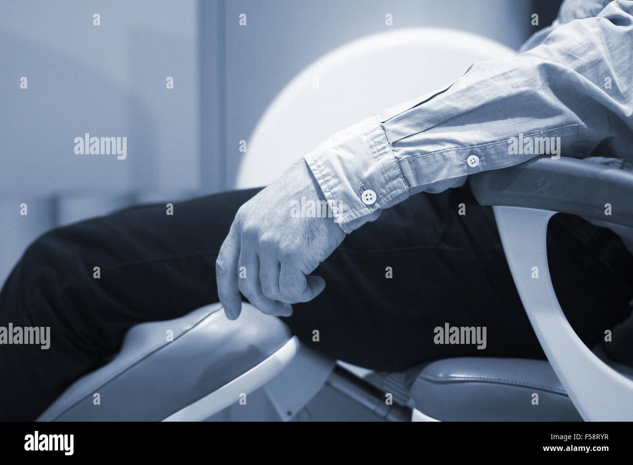 Patient in fully open MRI CAT Scan scanning arm, elbow, forearm, hand ...