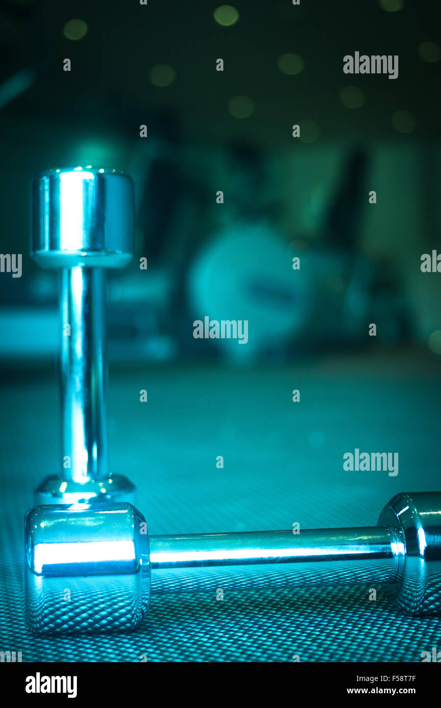 Dumbbell gym metal weights in exercise room in sports bodybuilder gym ...