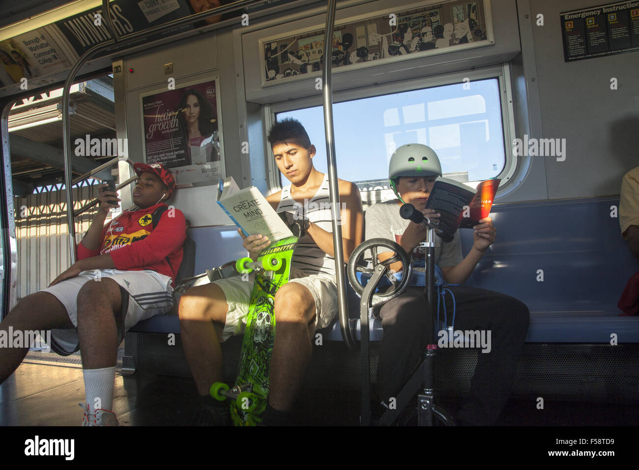 Reading on subway hi-res stock photography and images - Alamy