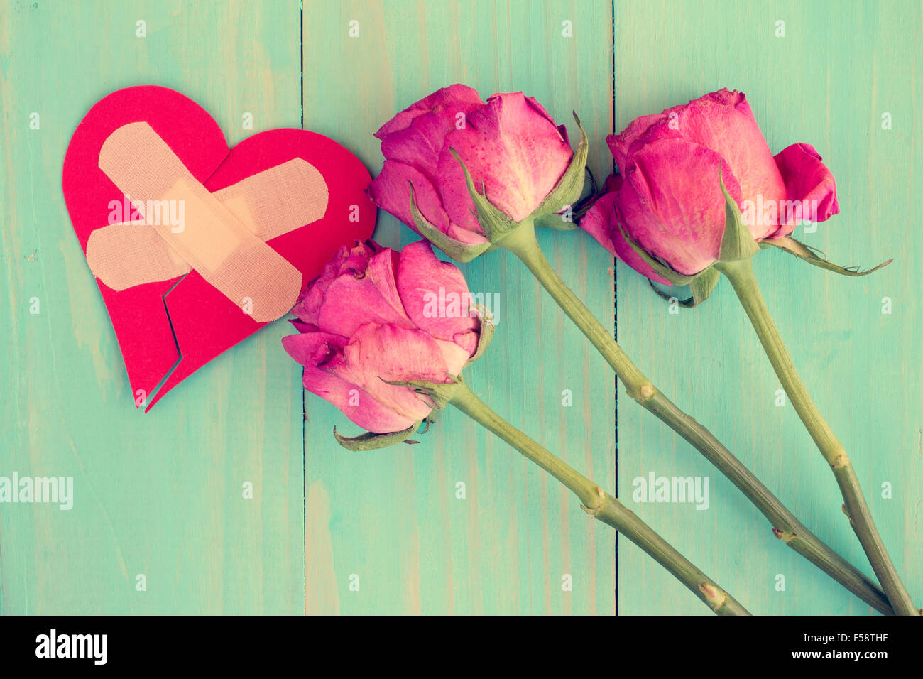 Red rose broken heart hi-res stock photography and images - Alamy