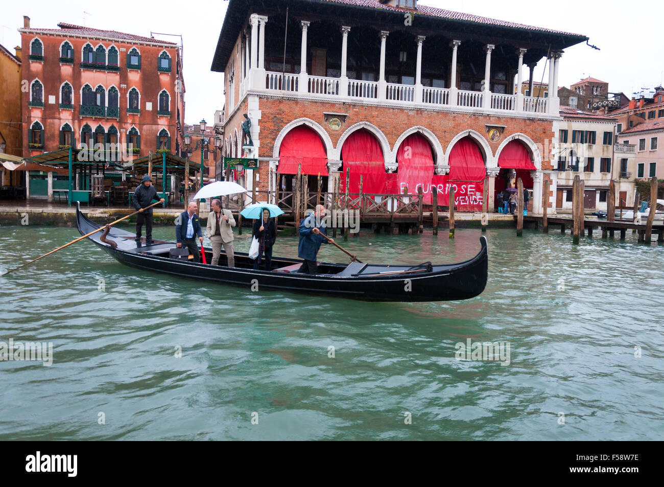 Crossing the Grand Canal by traghetto ferry in the rain, Venice, Italy ...