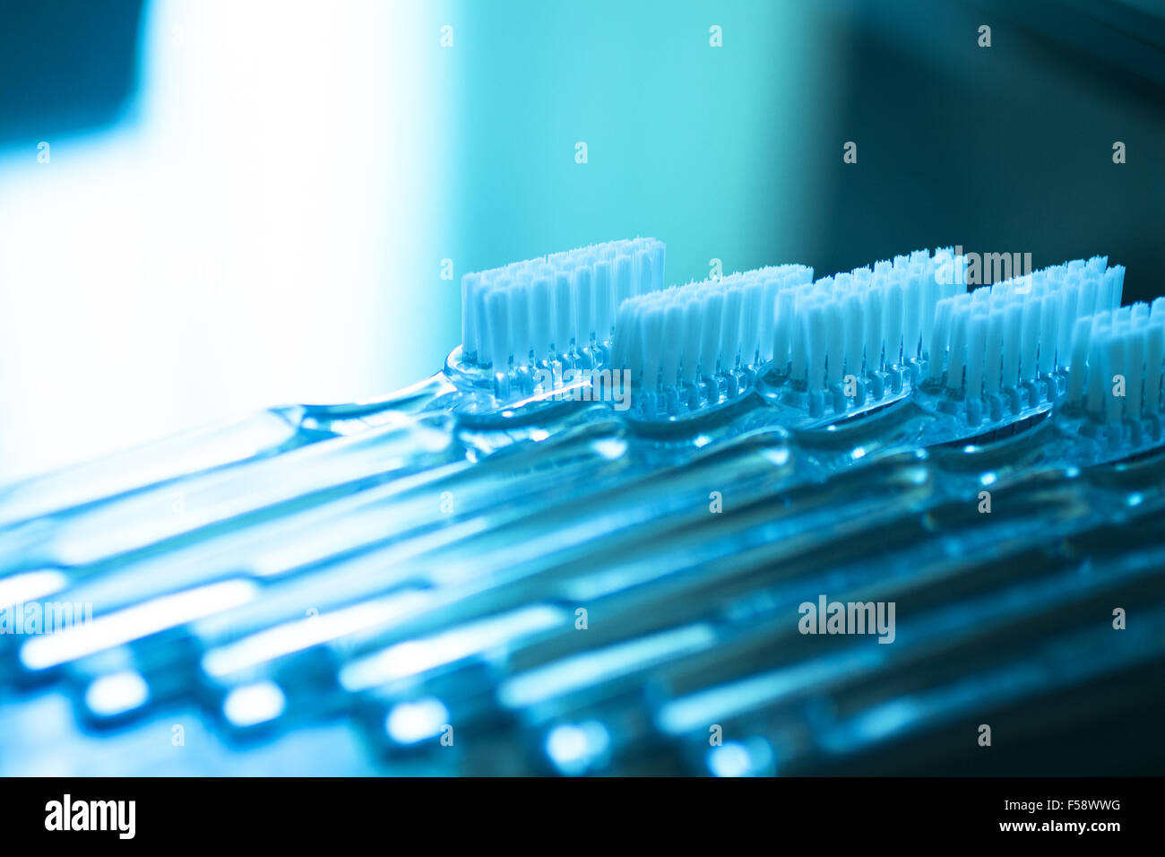 Toothbrushes on glass table dental hygiene plaque control in dentists ...