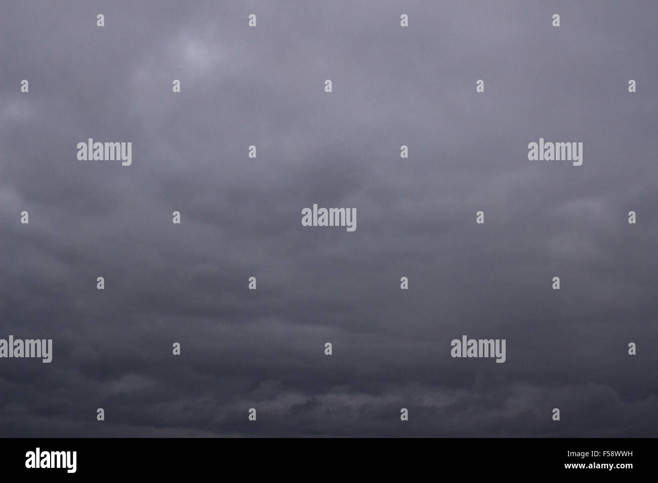 Contracting thunderstorm dark stormy gray blue clouds sky color photo ...