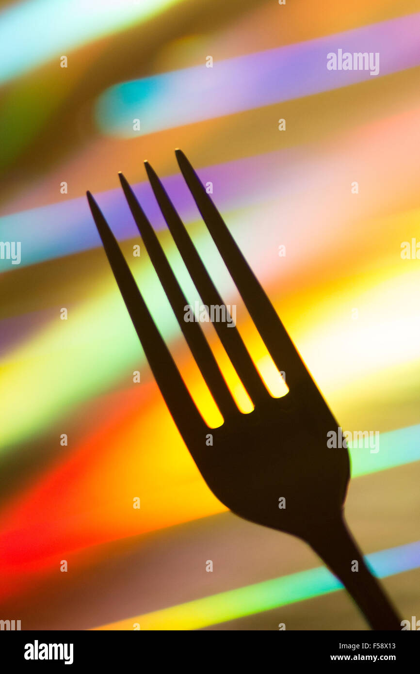 Fork dining symbol silhouette on colorful background photo Stock Photo ...