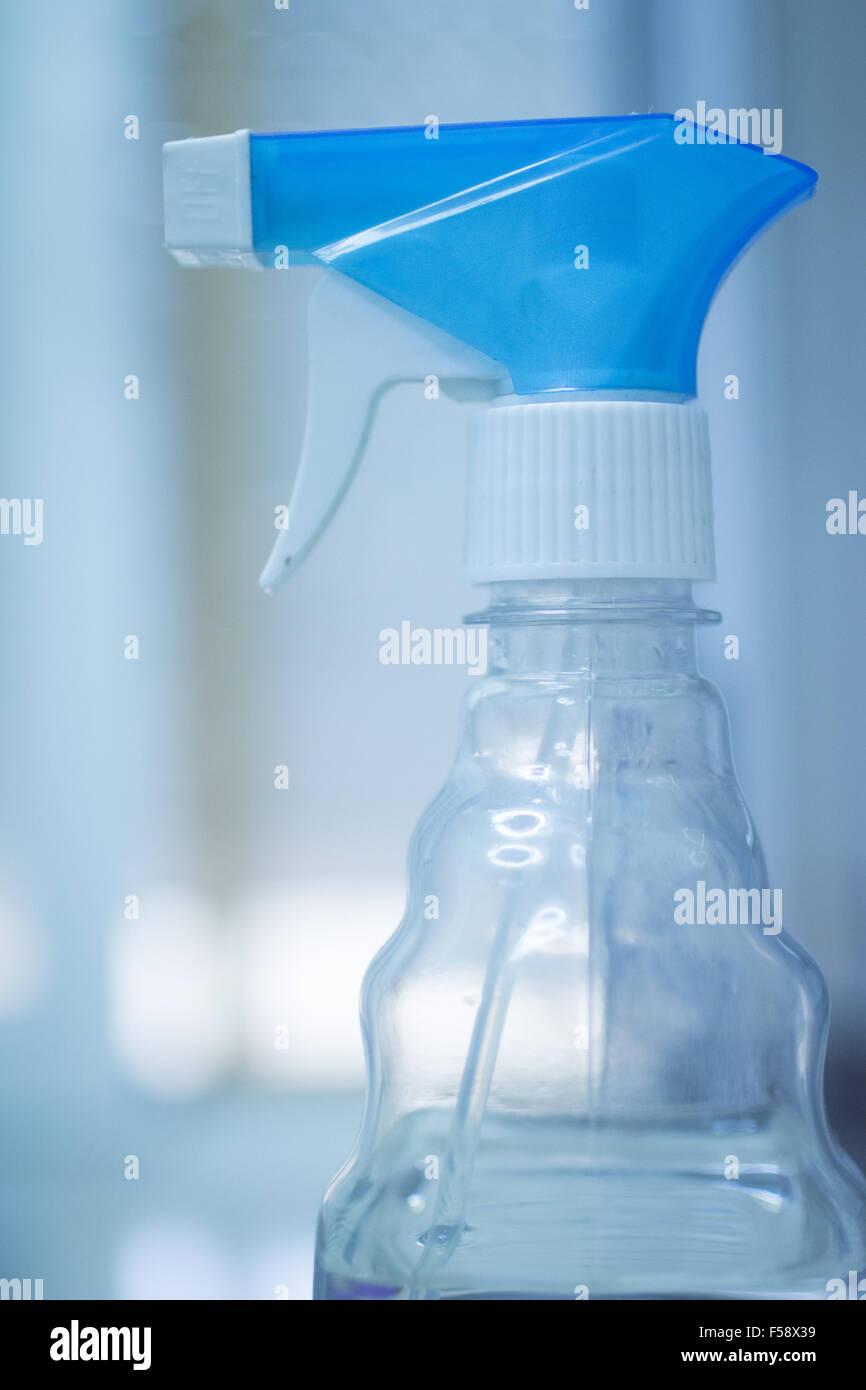 Household domestic cleaning liquid spray plastic bottle in blue and ...