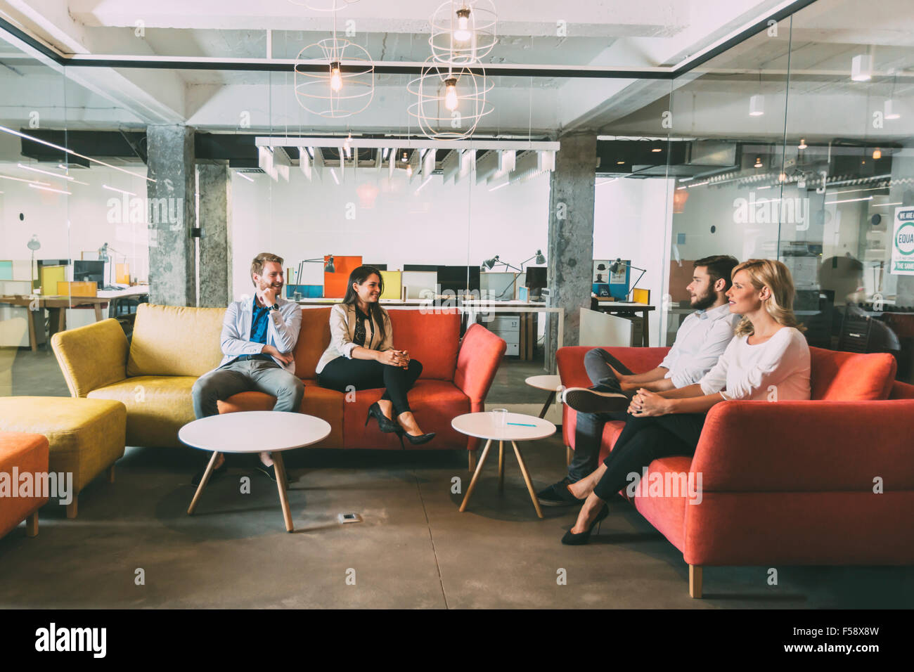 Group of young smart people talking in modern cafe Stock Photo - Alamy
