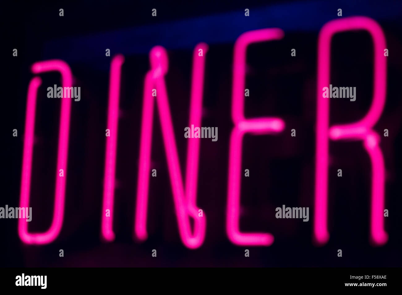 Diner neon sign at night in street photo Stock Photo - Alamy